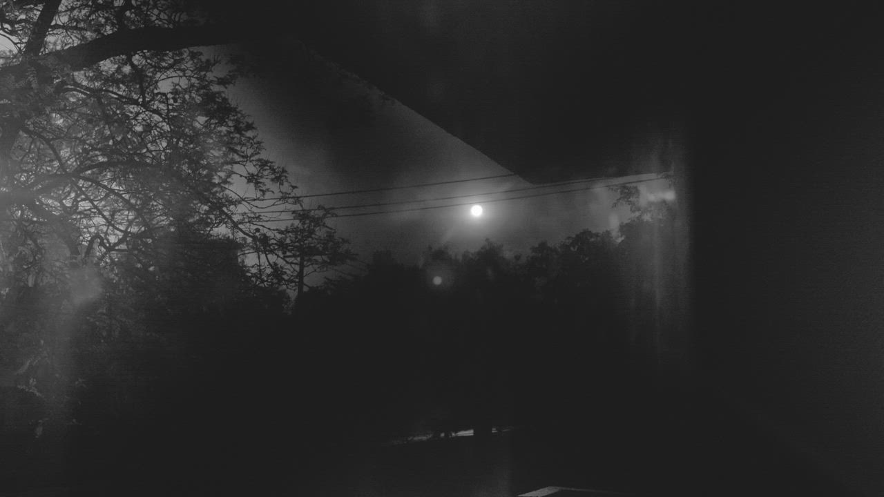 View from a window of the night outside - Free Stock Video