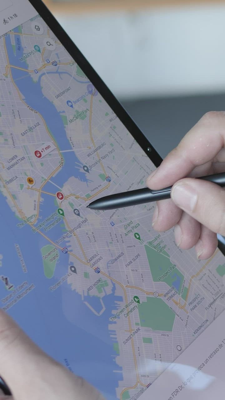 Locating an area on a digital map on a tablet - Free Stock Video