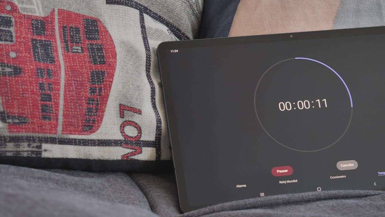Tablet on a sofa running a timer - Free Stock Video