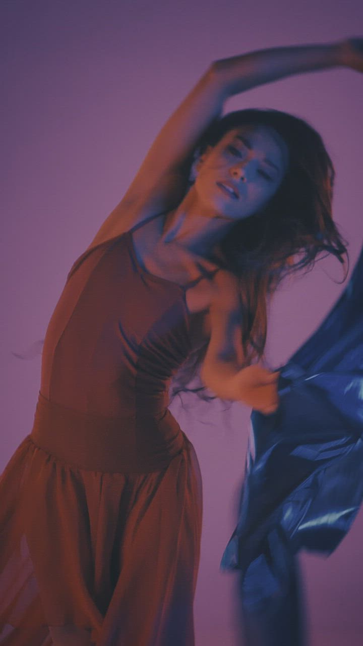 Dancing girl in red dancing artistically - Free Stock Video