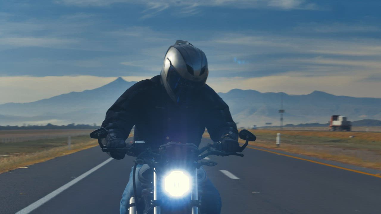 Riding a motorbike fast on a highway - Free Stock Video