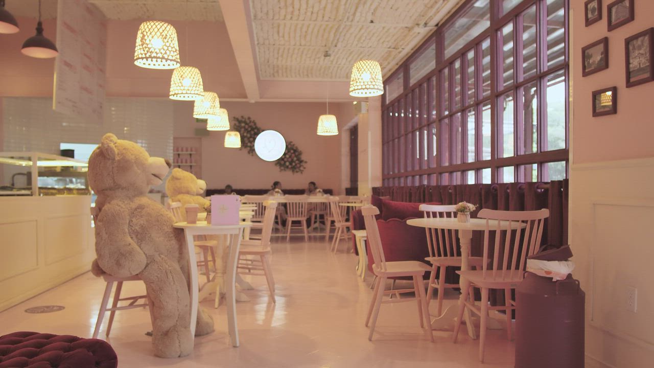 Couple walking into a romantic cafe on a date - Free Stock Video