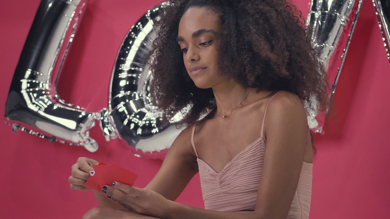 Girl opening a letter excited and captivated on Valentine's Day - Free ...