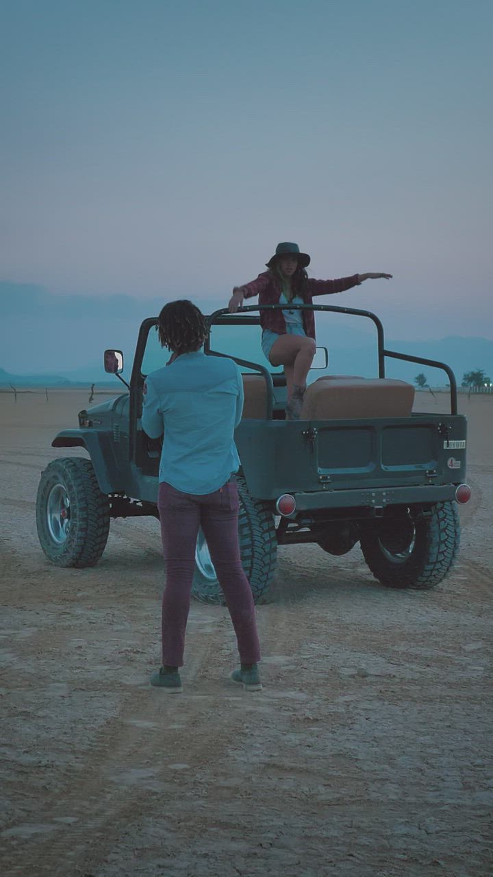 Friends having fun during a road trip stop - Free Stock Video