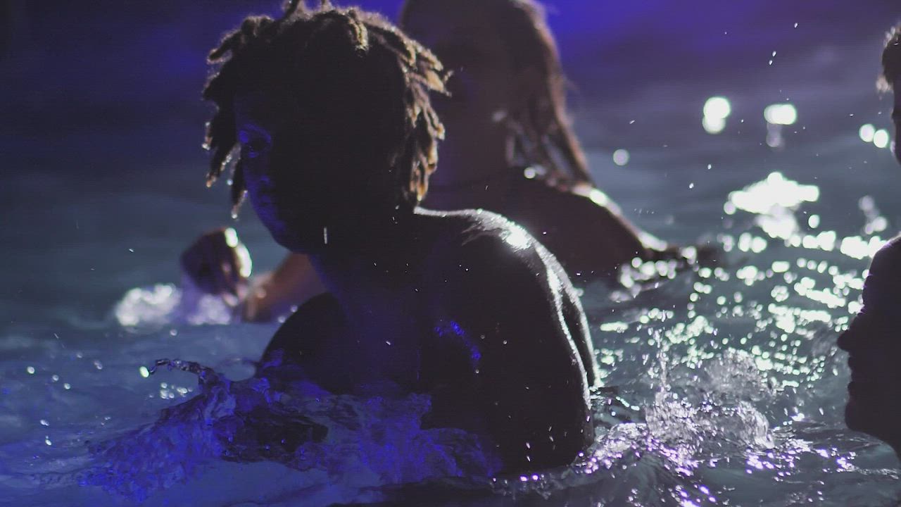 Boys and girls dancing in a pool - Free Stock Video