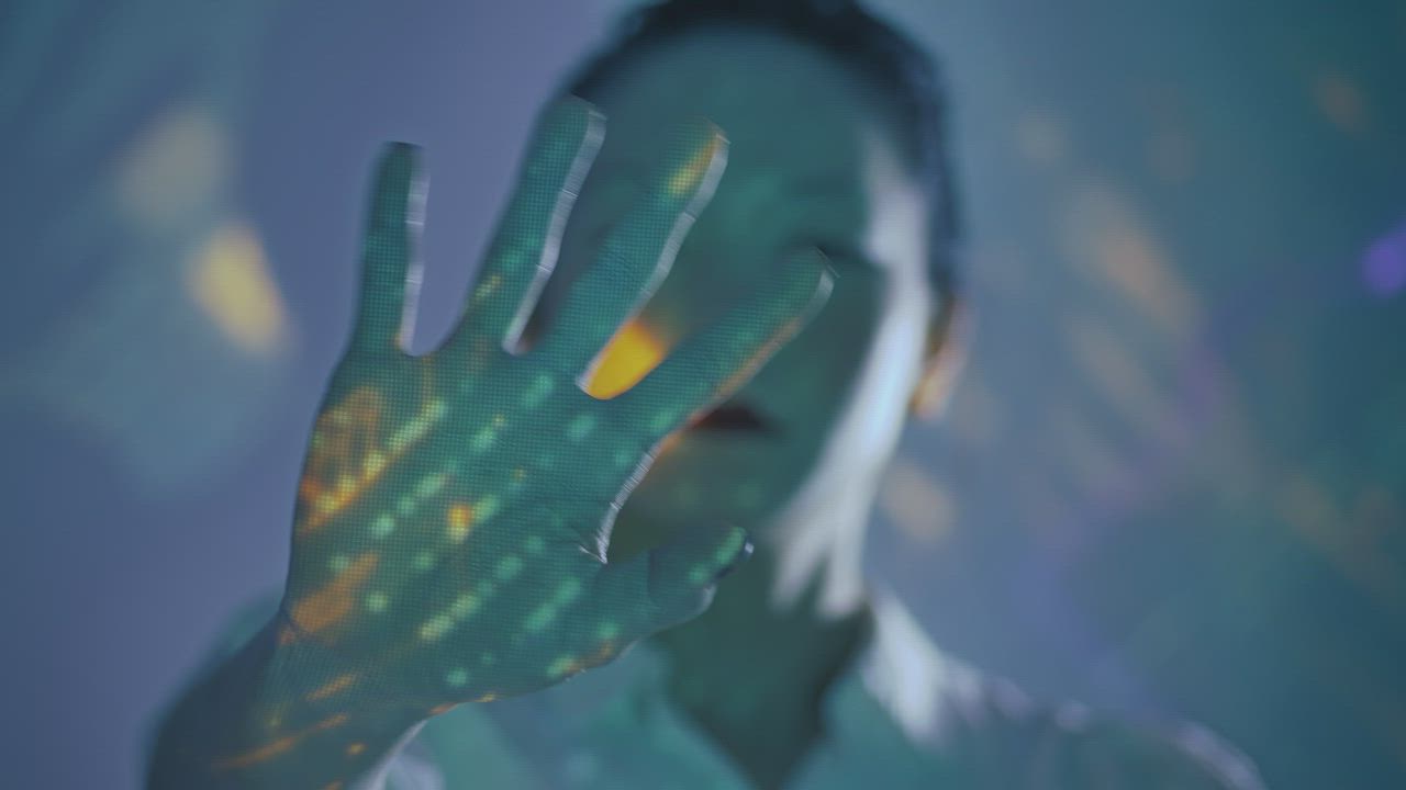 Female cyborg moving her hand - Free Stock Video