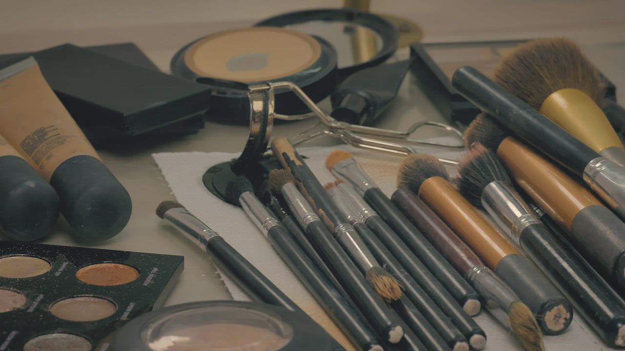 Many makeup items on a table - Free Stock Video