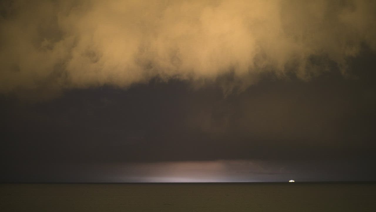 Electric storm over the ocean - Free Stock Video