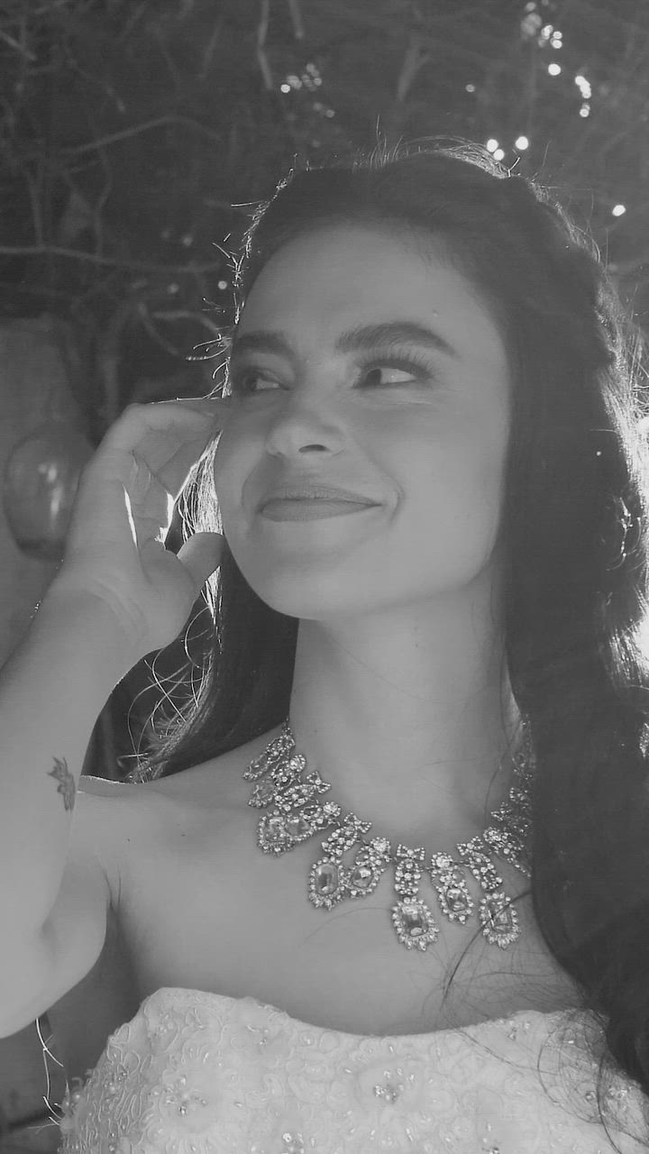 Portrait of a happy bride in the garden - Free Stock Video