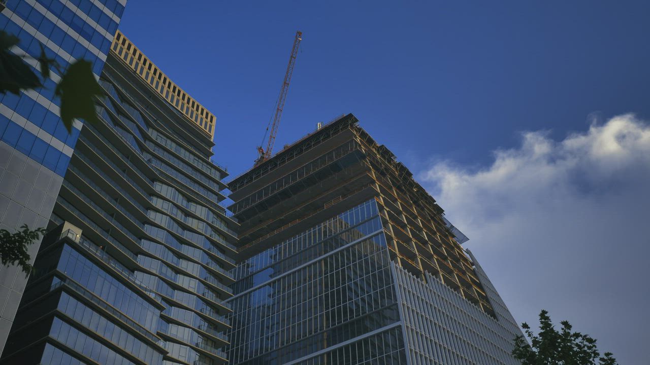 Immense and modern building under construction - Free Stock Video