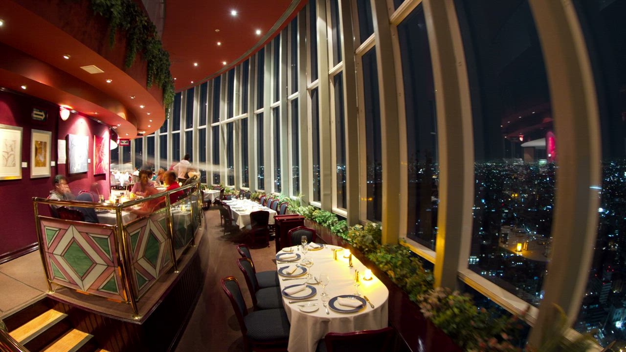 Revolving restaurant in a city - Free Stock Video