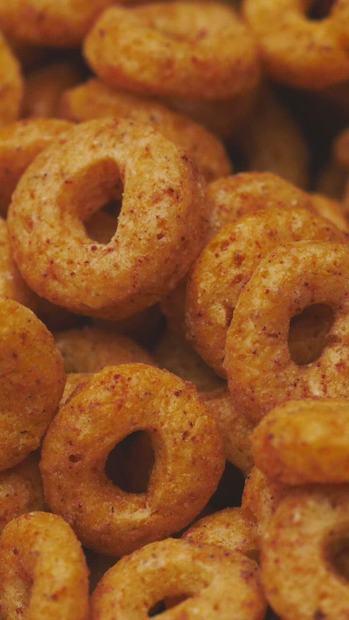 Cinnamon oat rings cereal, slowly rotating - Free Stock Video