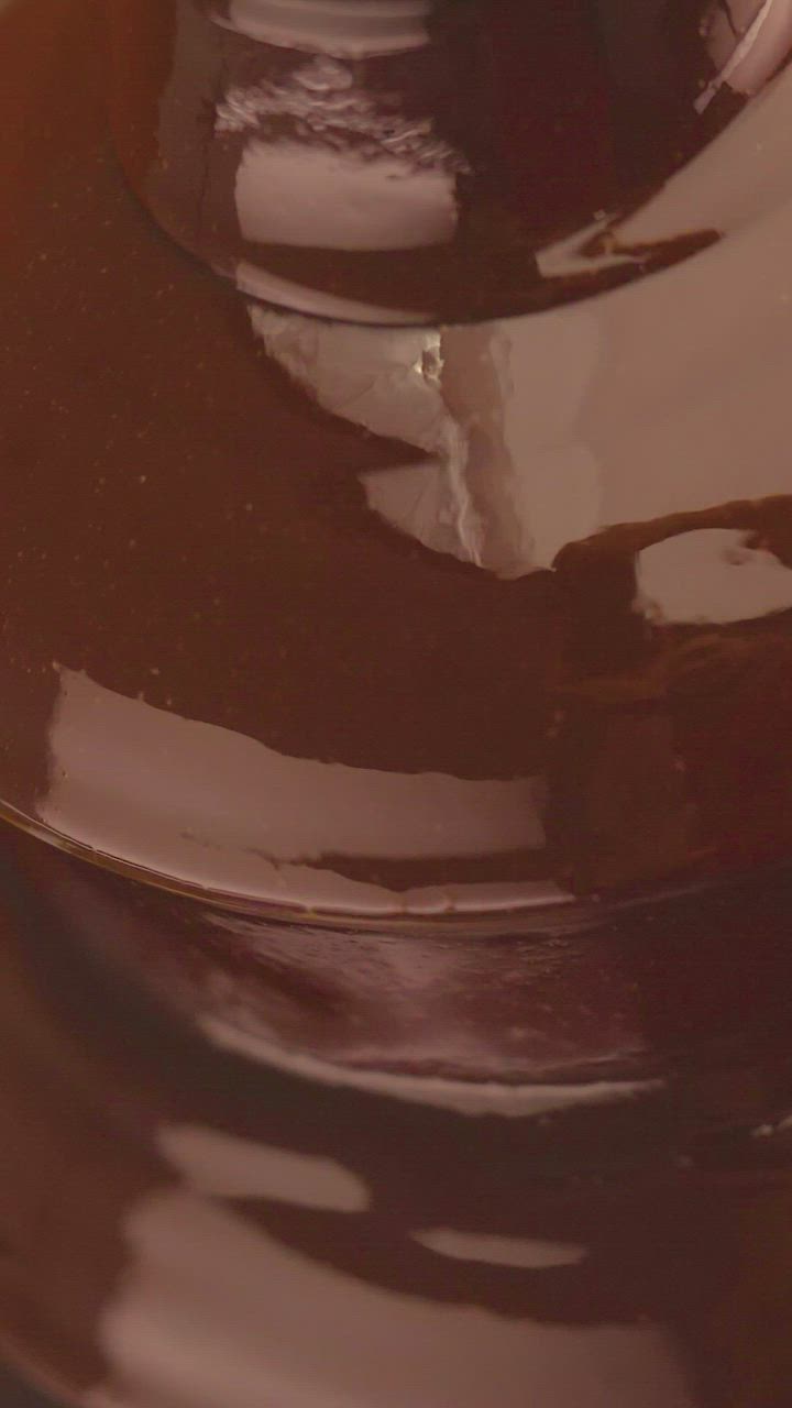 Texture of a liquid chocolate fountain - Free Stock Video