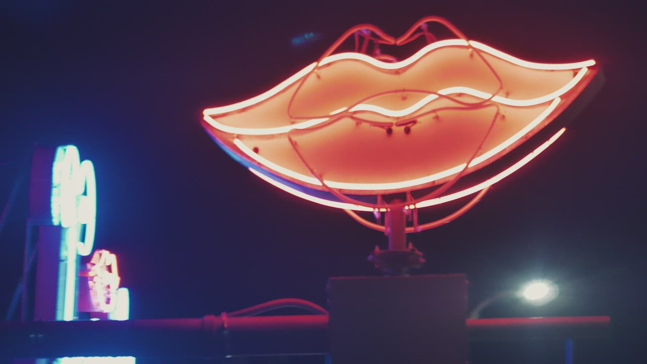Rotating Neon Lips Sign - Free Stock Video