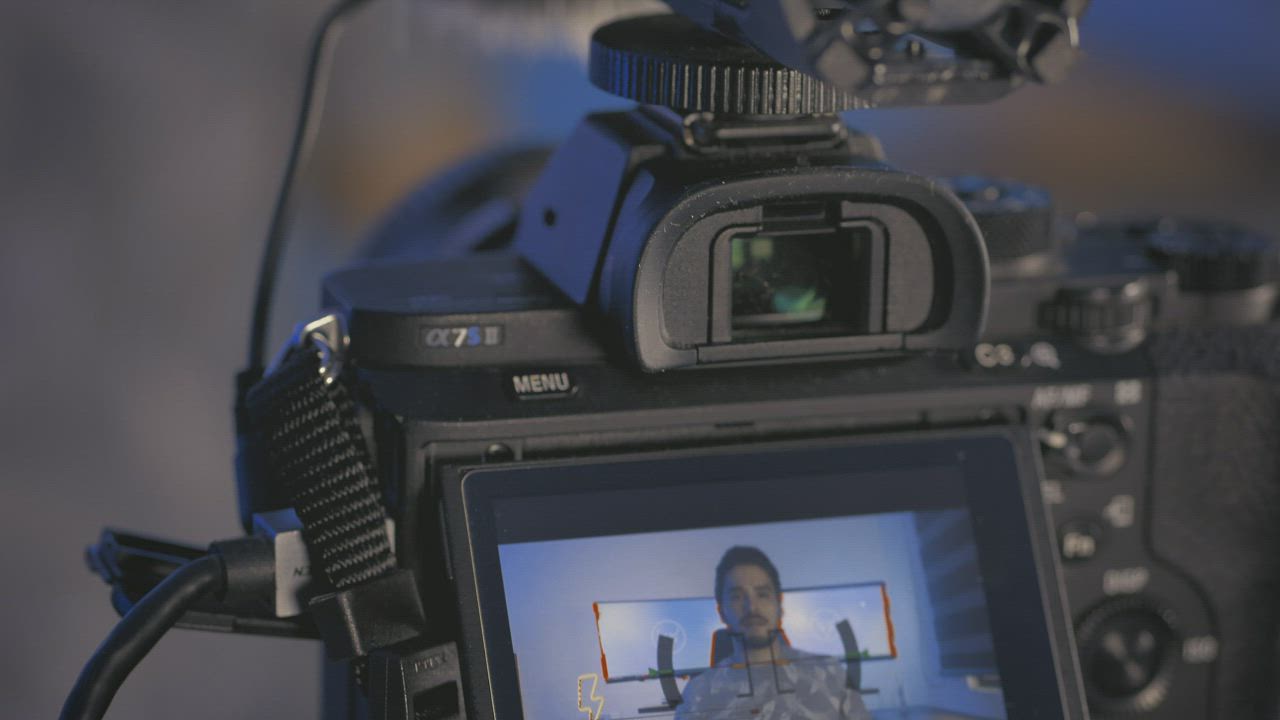 Vlogger recording with his camera - Free Stock Video