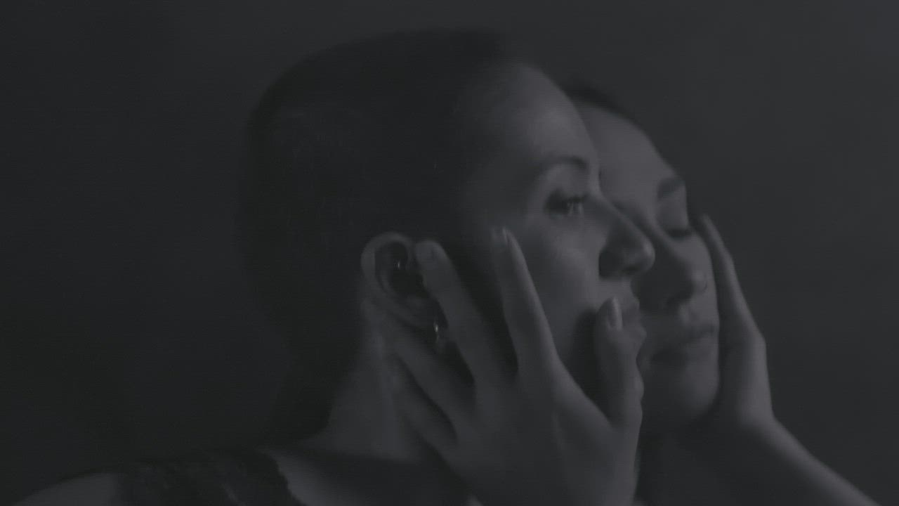 Faces of two dancers during a performance - Free Stock Video