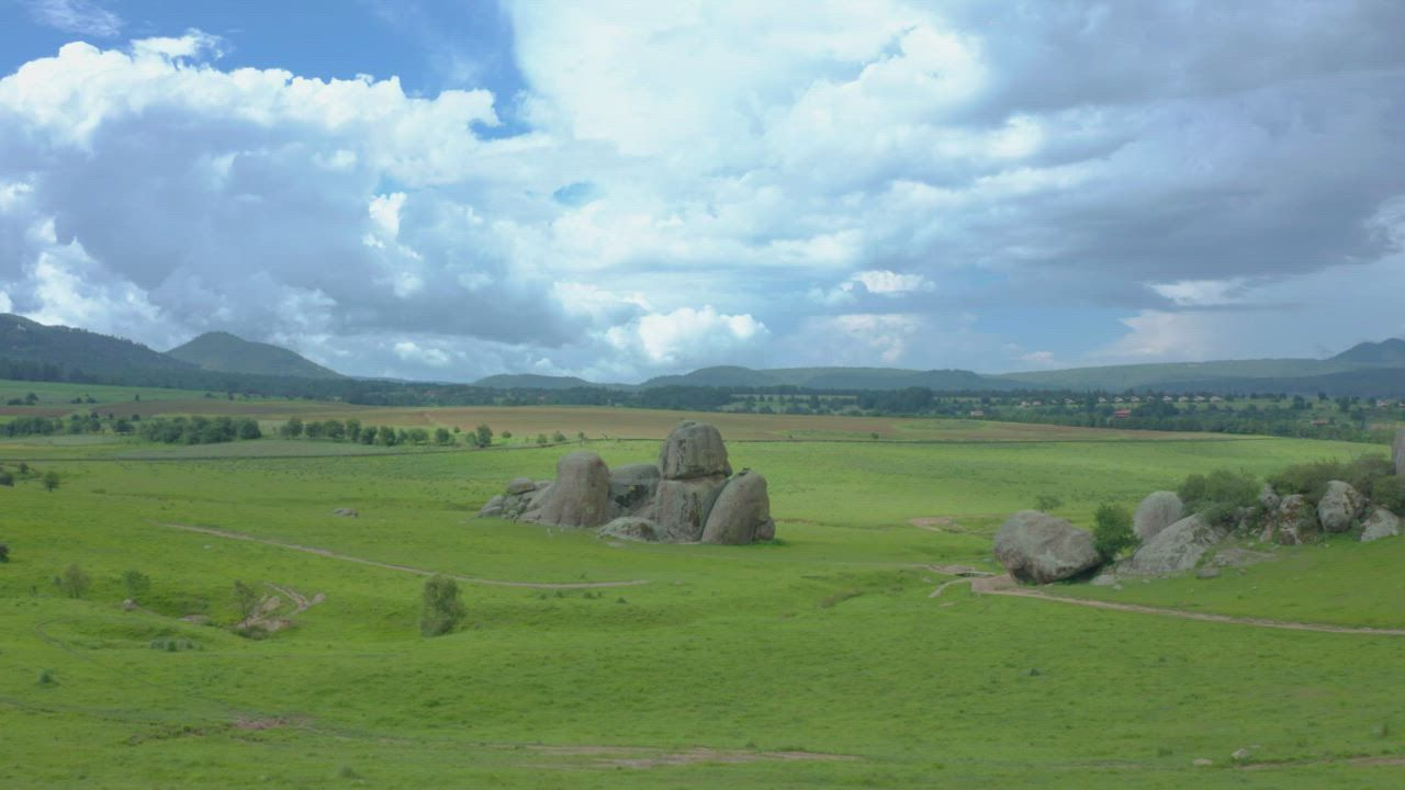 Huge rocks on a plain, seen from above - Free Stock Video