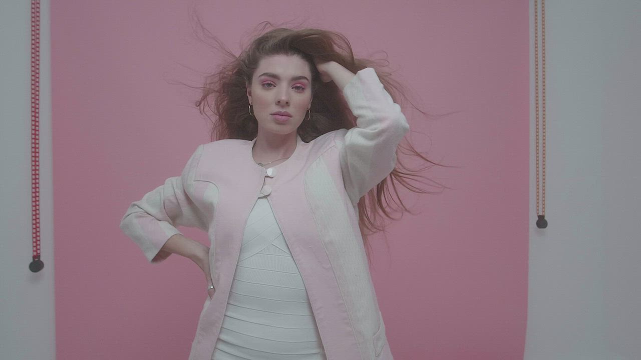 Portrait of a woman moving her hair in slow motion - Free Stock Video