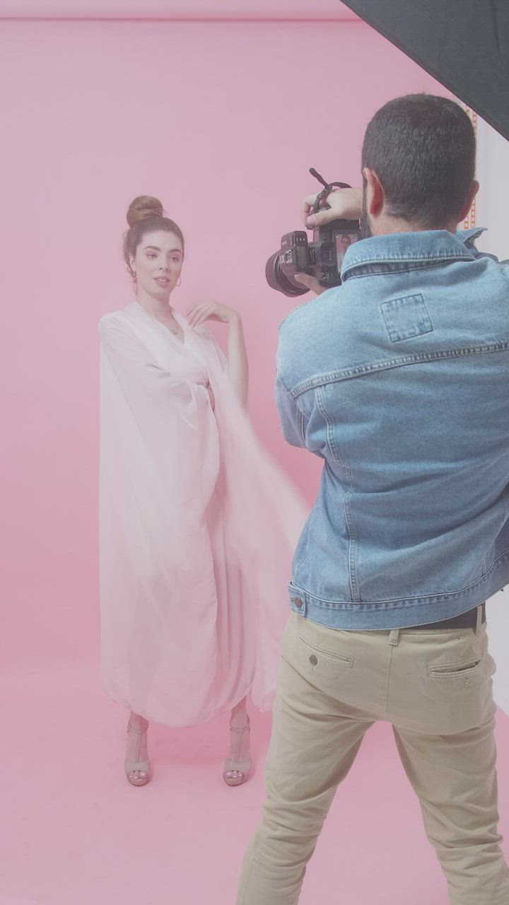 Photoshoot with a young female model - Free Stock Video