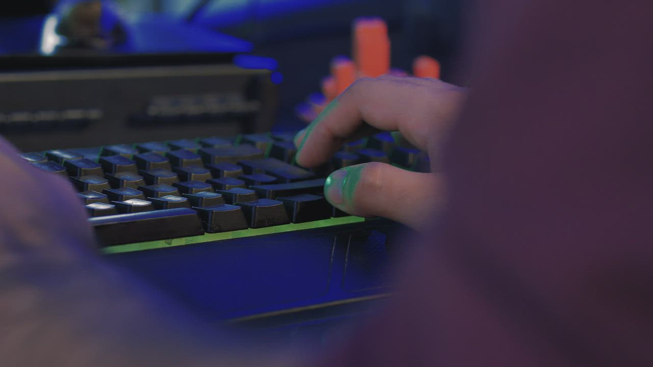 Hands of a programmer typing on a keyboard - Free Stock Video