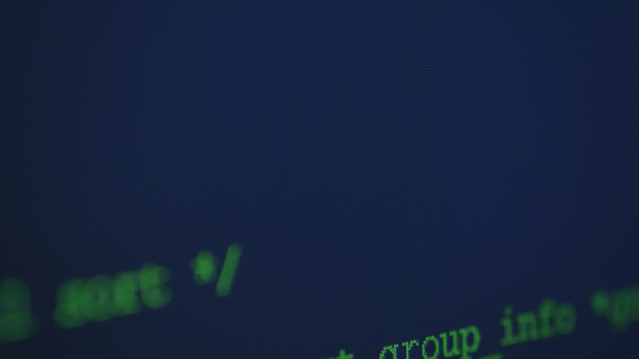Close-up view of a screen with programming codes - Free Stock Video