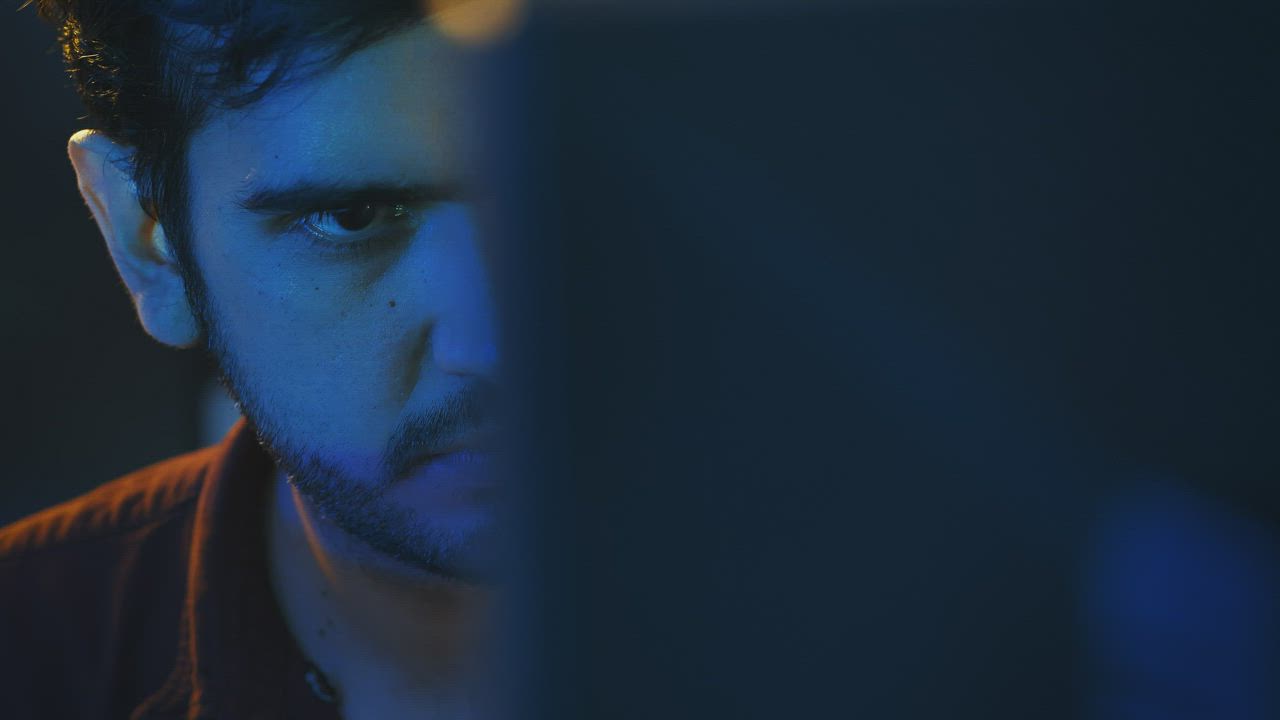 Face of a focused programmer during work - Free Stock Video