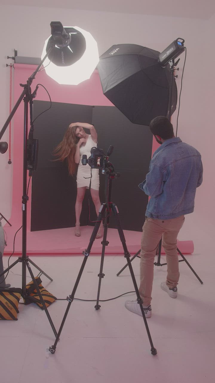 Female model posing captivatingly in a photoshoot - Free Stock Video