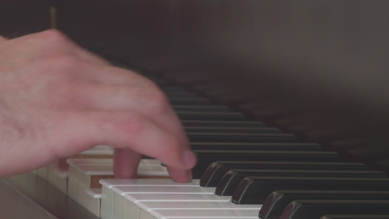 Hands of an expert pianist playing a song - Free Stock Video