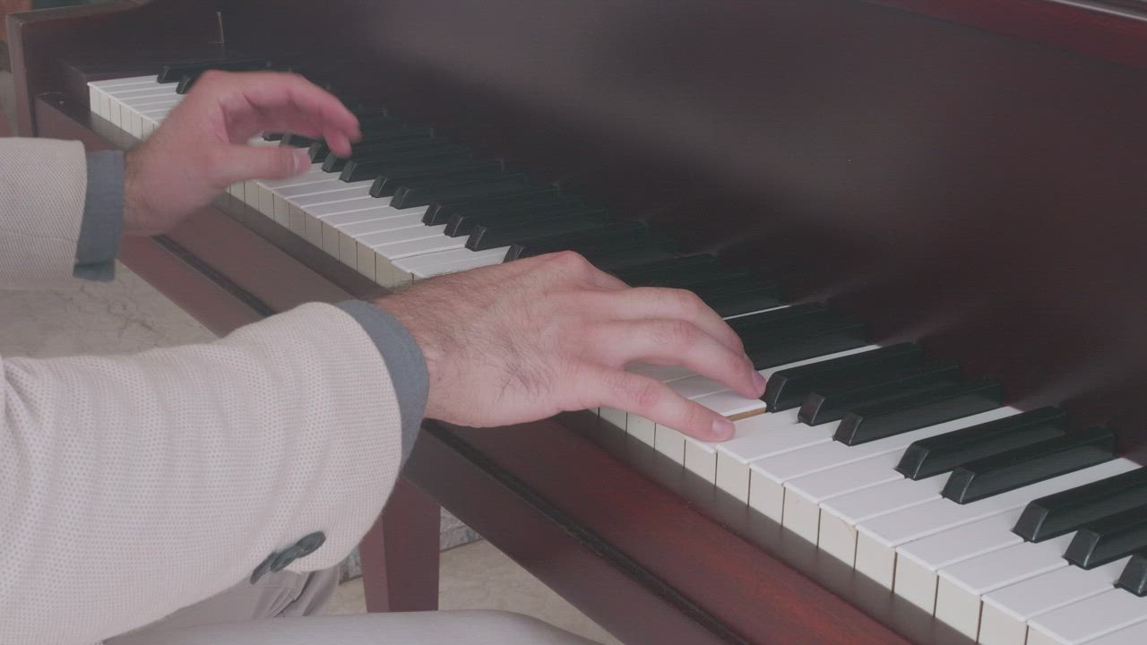 Hands of a skillful and elegant pianist playing - Free Stock Video