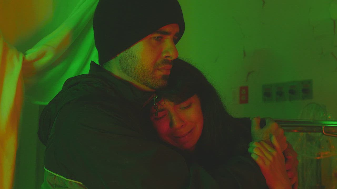 Man comforting a girl who is crying loudly - Free Stock Video