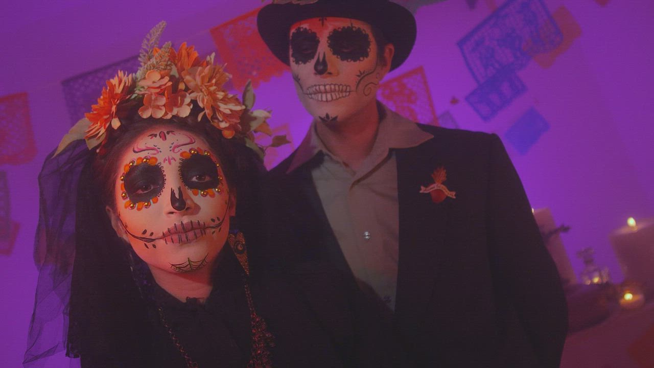 Portrait of a couple, dressed as catrin and catrina - Free Stock Video
