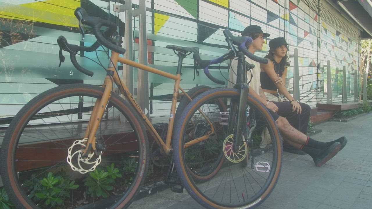 Boy and girl resting after a bike ride - Free Stock Video