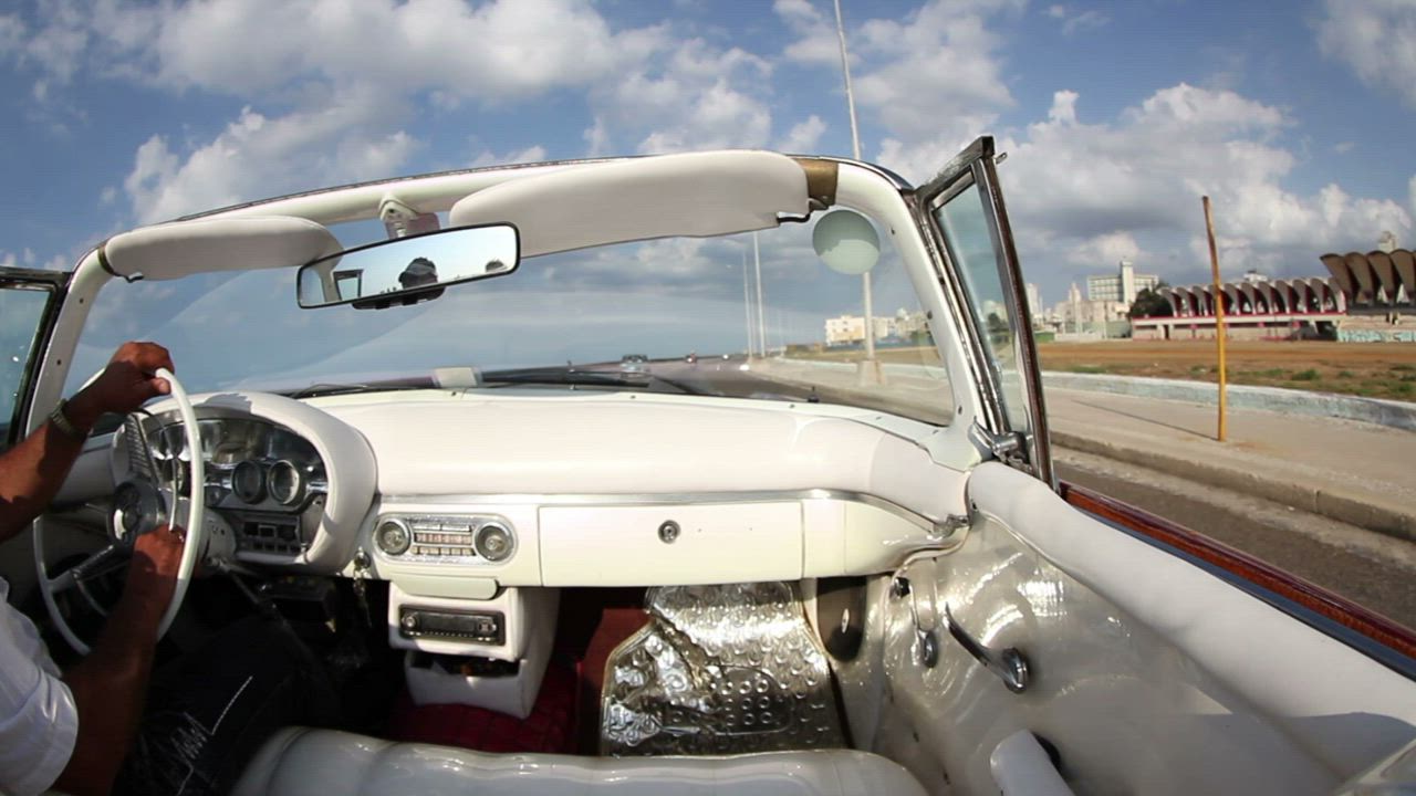 Driving a classic convertible car - Free Stock Video