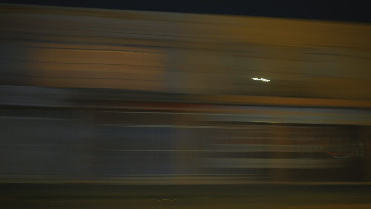 Side view of a vehicle in traffic, time lapse shot - Free Stock Video