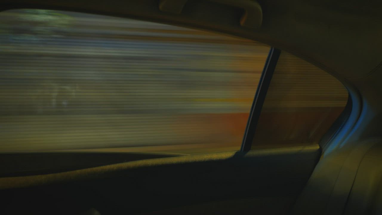 View out of a car window at night - Free Stock Video