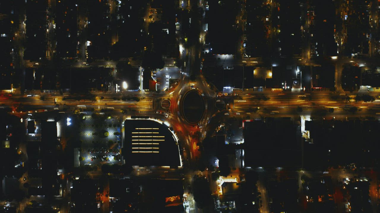 Two-level roundabout in a city at night - Free Stock Video