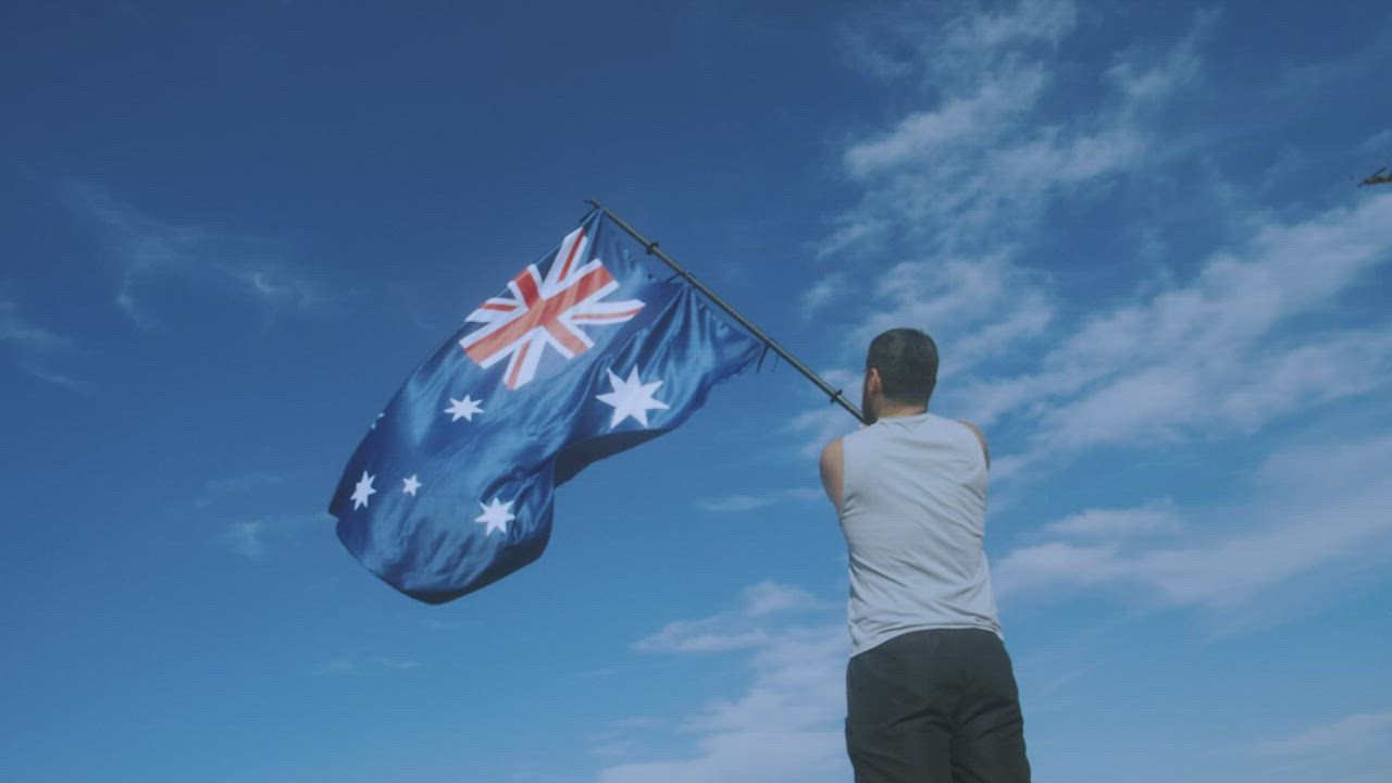 Man waving an Australian flag - Free Stock Video