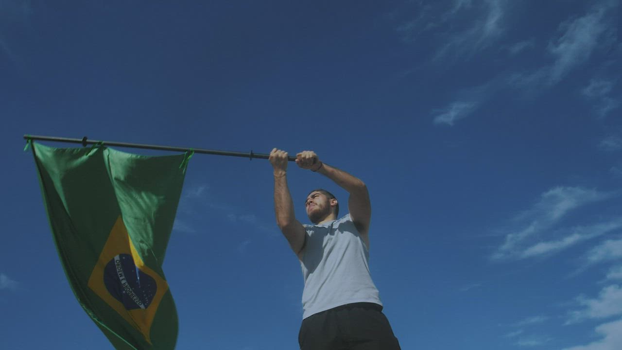 Young man waving the flag of Brazil - Free Stock Video