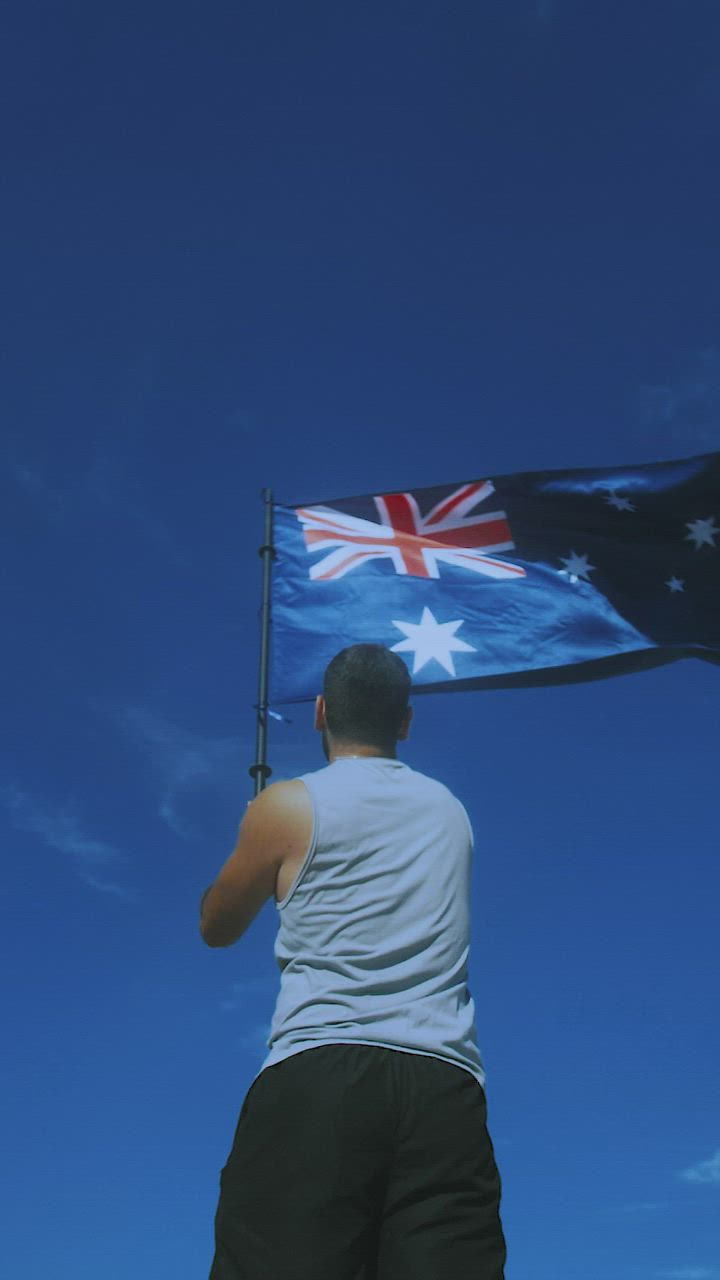 Man waving the Australian flag - Free Stock Video