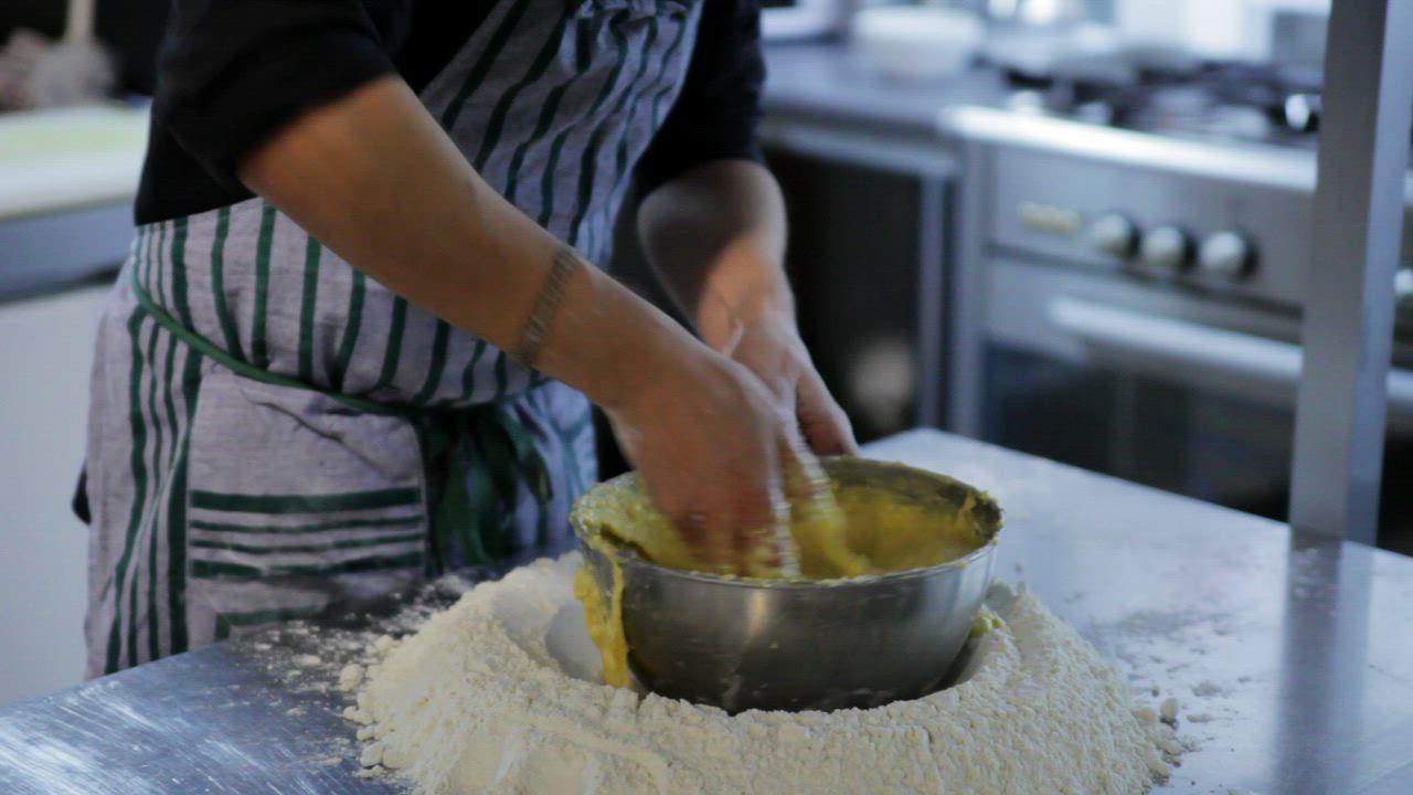 Chef preparing a cake in a restaurant kitchen - Free Stock Video