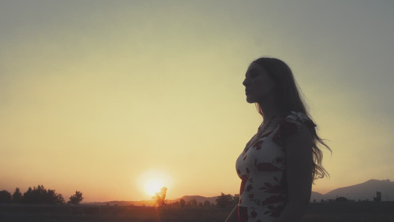 Girl with Mexican style on a ranch at sunset - Free Stock Video
