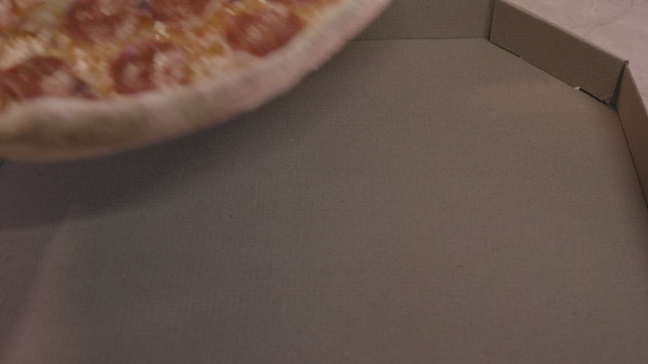 Close up shot of a freshly made hot pizza - Free Stock Video
