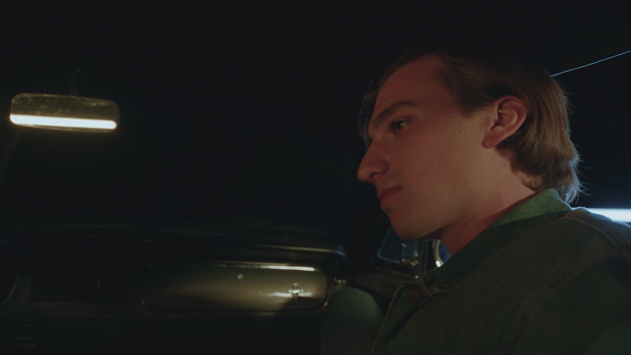 Romantic couple inside a car at night - Free Stock Video