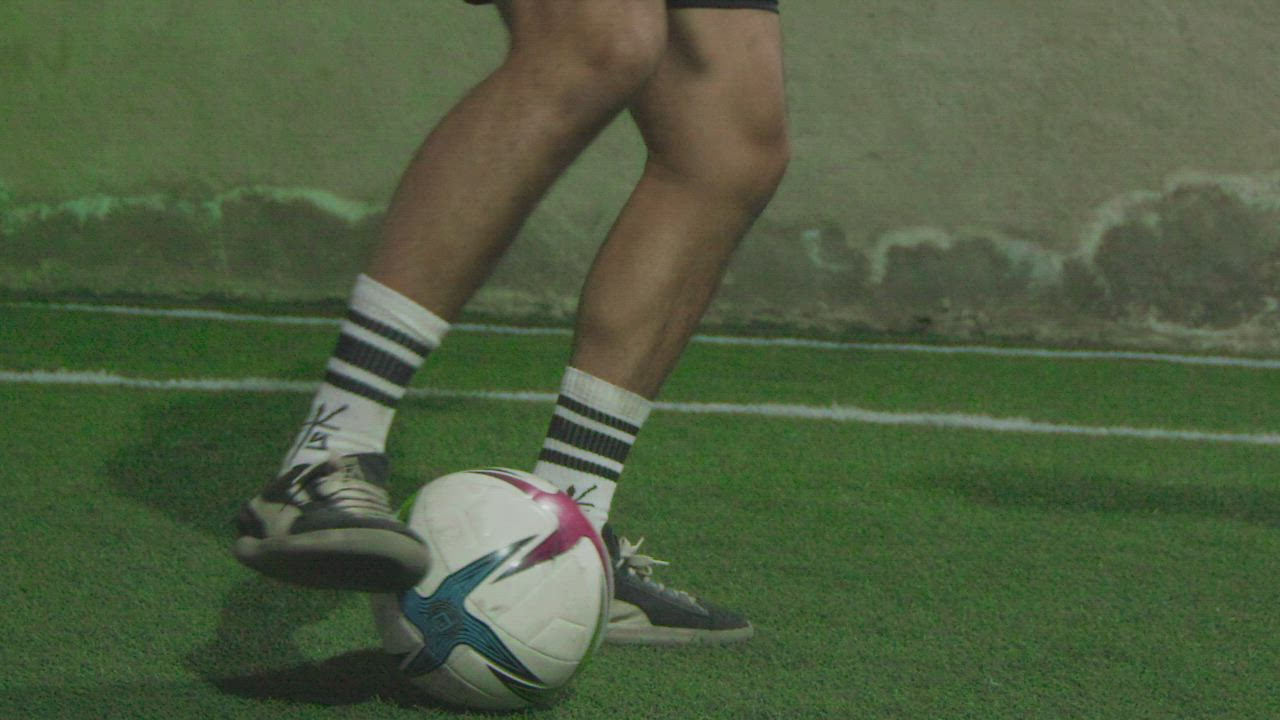 Feet of a skillful soccer player dribbling - Free Stock Video