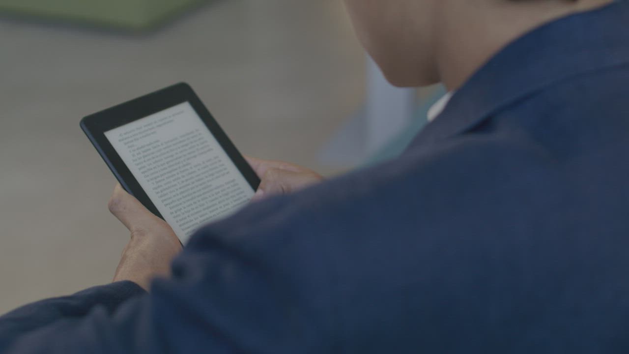 Man reading an electronic book - Free Stock Video