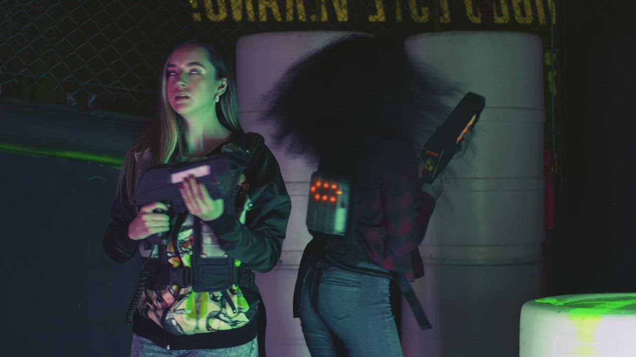 Women's team playing laser tag - Free Stock Video