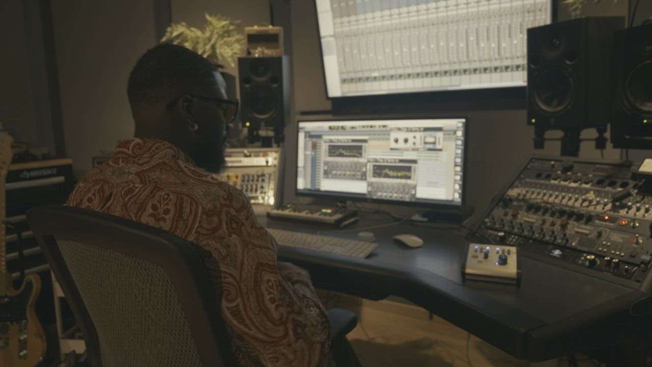 Producer working in a recording studio - Free Stock Video