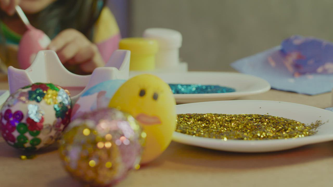 Family decorating easter eggs - Free Stock Video