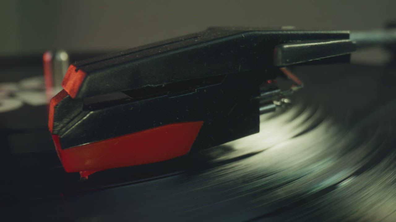 Close view of a record rotating on a turntable - Free Stock Video