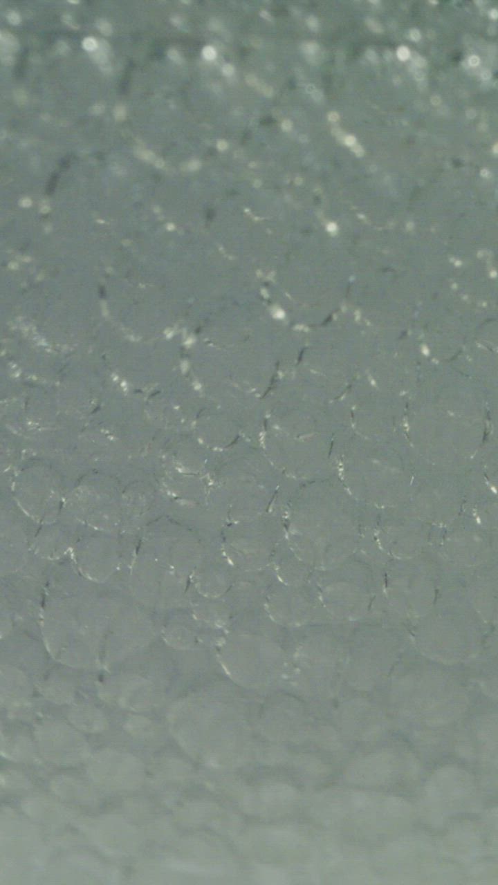 Close texture of bubbles of a gaseous liquid - Free Stock Video